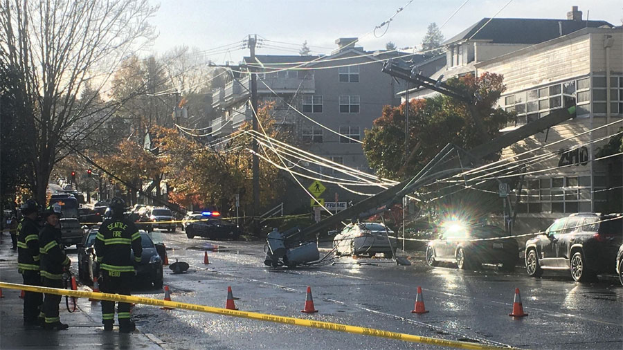 Power pole falls on Seattle building amid stormy conditions Tuesday ...