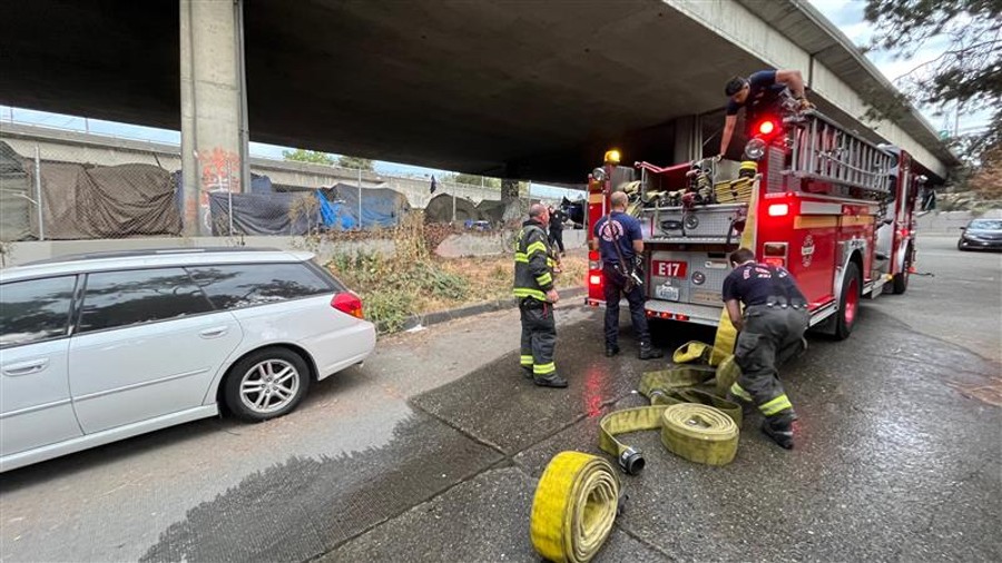 Encampment fire under Seattle's Ship Canal Bridge causes backups on I-5 ...