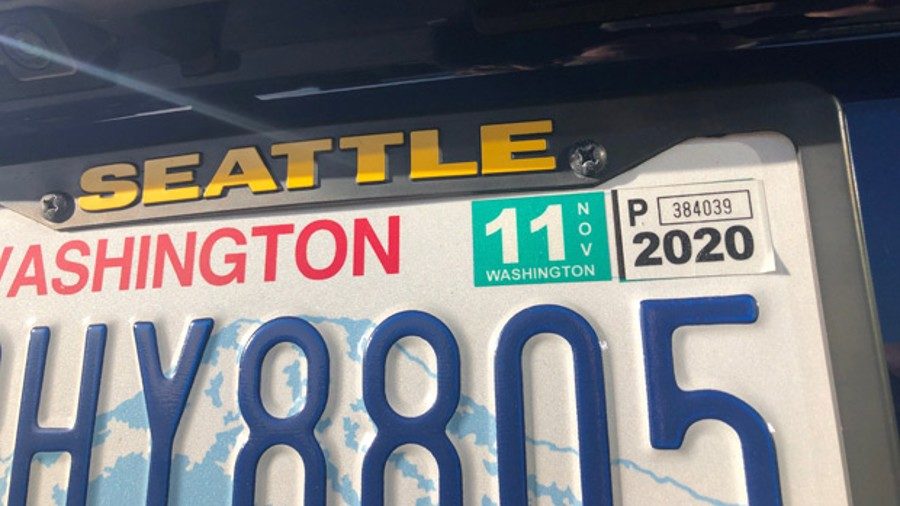 What's with all the expired car tabs on the road?