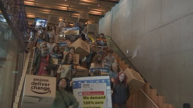 ‘What do we want? Zero emission!’: Students protest the speed of Amazon ...