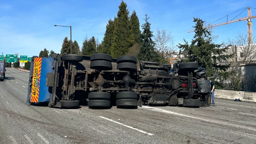 All lanes now open on I-90 west at I-5 after truck overturned
