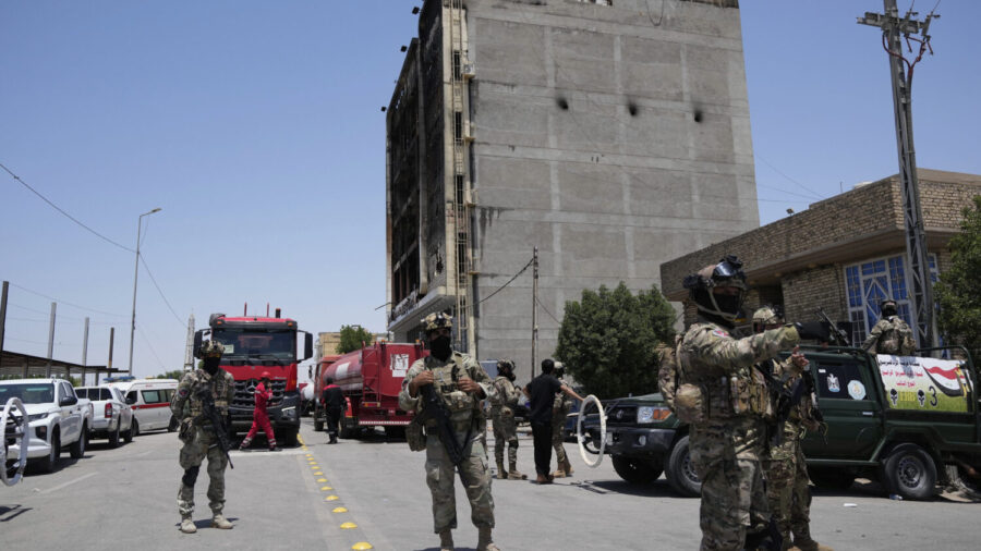 A fire at a mall in eastern Iraq kills more than 60 people ...