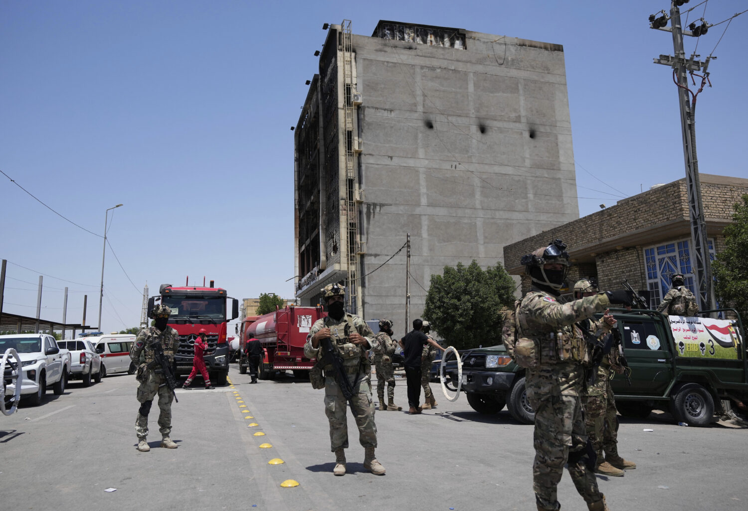 A fire at a mall in eastern Iraq kills more than 60 people ...
